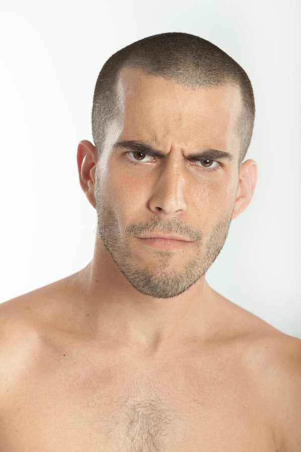 Frowning young man stock photo. Image of frowning, furious - 67202490
