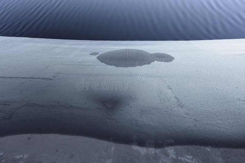 Frozen Asphalt Surface is Covered by Cold Ice. Texture, Structure and ...