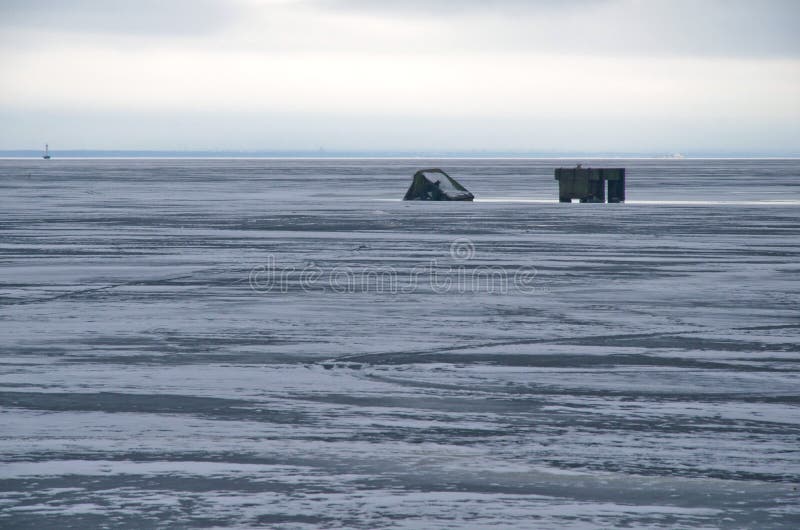Frozen Bay and the Remains of Buildings Background/ Stock Photo - Image ...