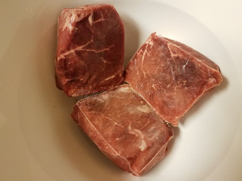 Frozen Beef Meat Squares in White Plastic Container Stock Image - Image ...