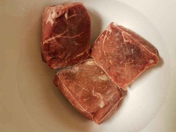 Frozen Beef Meat Squares in White Plastic Container Stock Image - Image ...