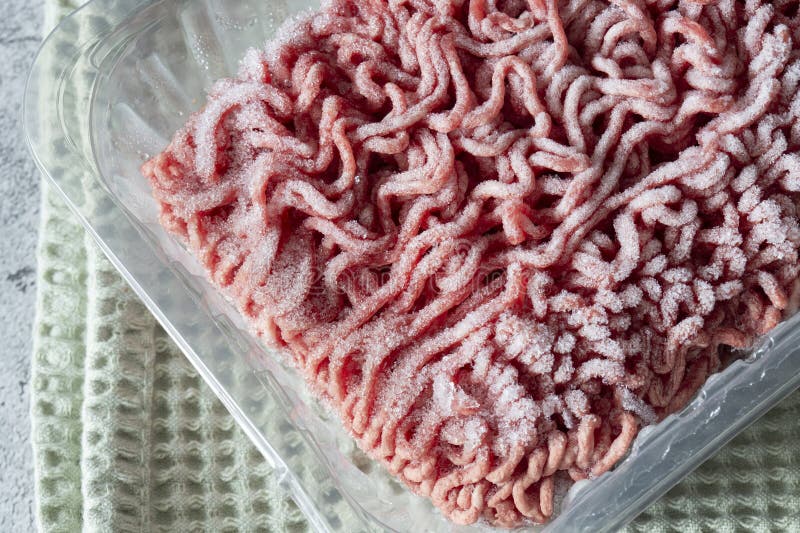 Frozen Beef Steak Mince in a Plastic Container Defrosting. Stock Photo ...