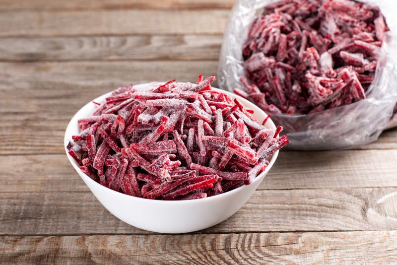 Frozen Beet in a White Plate on a Table. Frozen Food, Frozen Vegetables ...