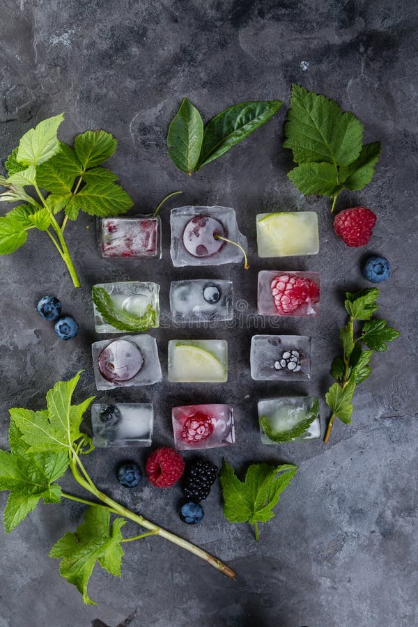 Frozen Berries in Ice Cubes Stock Photo - Image of fruit, cool: 96394998