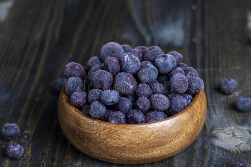Frozen Blueberries on a Wooden Table Stock Image - Image of blueberry ...