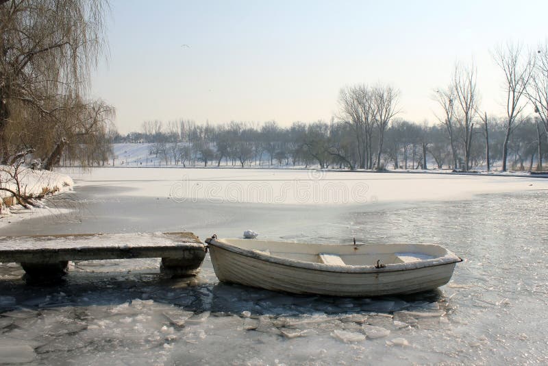 Frozen boat stock image. Image of morning, park, light - 24982877