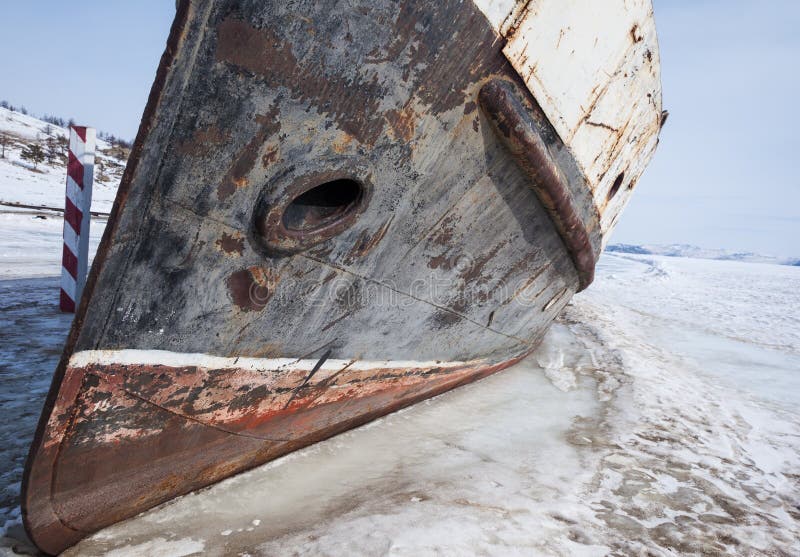 Frozen boat at the shore stock photo. Image of moorage - 31893728