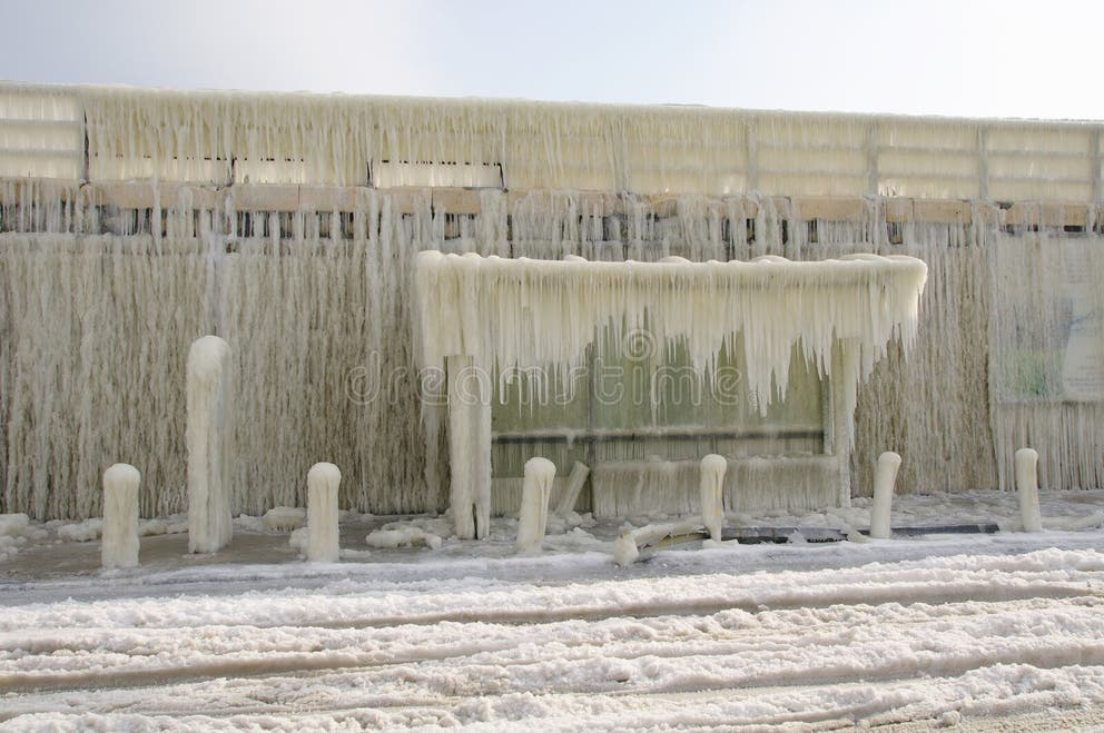 Frozen Breakwater and Bus Stop after Winter Storm Stock Image - Image ...