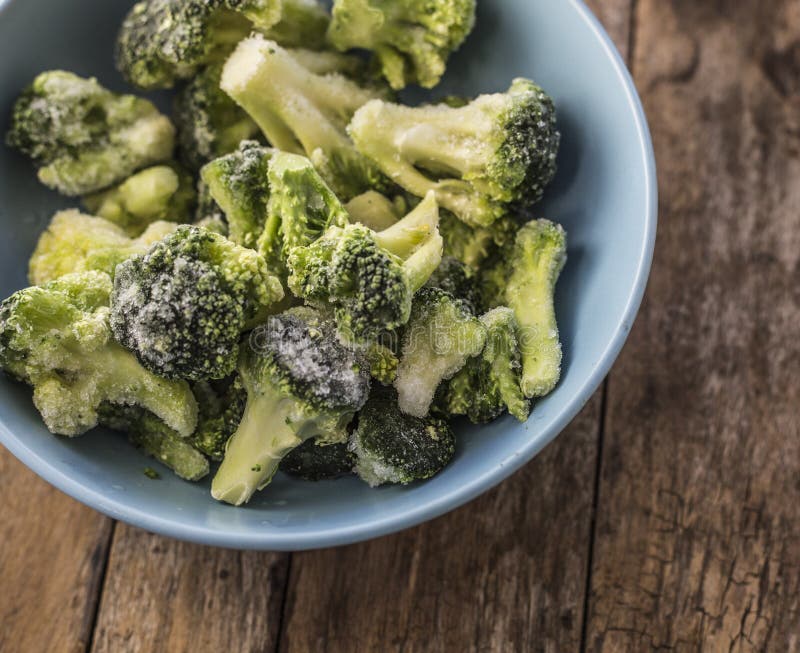 Frozen Broccoli in Blue Bowl Stock Photo - Image of background ...