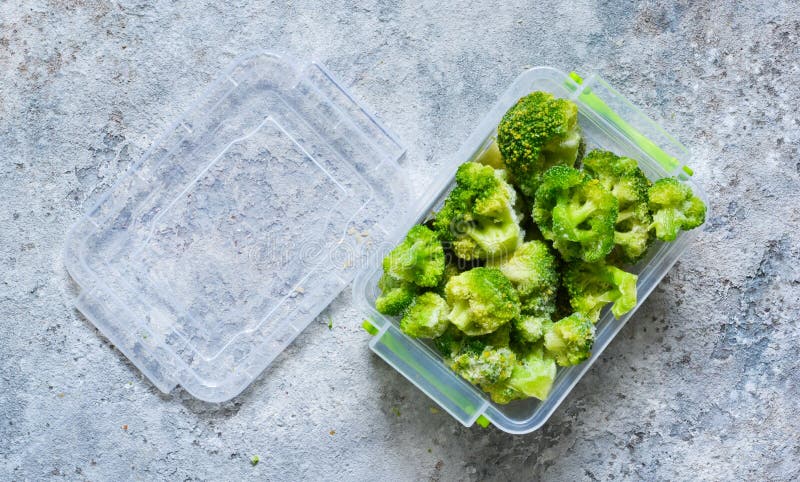 Frozen Broccoli in Lunch Box on a Concrete Background Stock Image ...