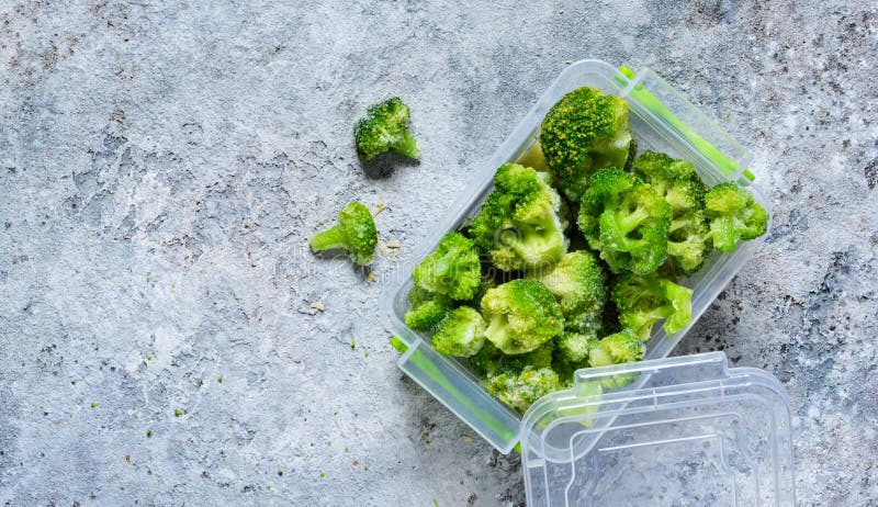 Frozen Broccoli in Lunch Box on a Concrete Background Stock Image ...