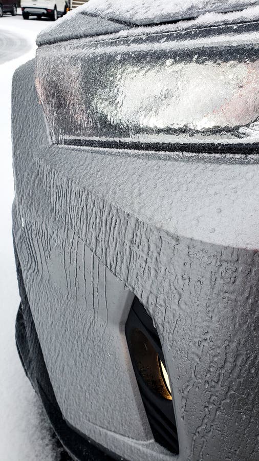 Frozen Car with Icy Headlight with Ice Smudges in Winter Stock Image ...