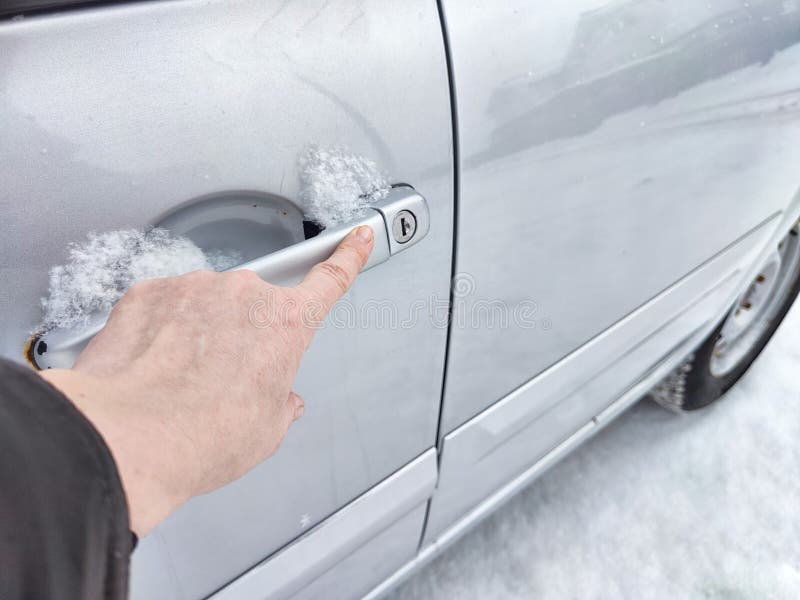 Frozen Car Lock on a Cold Winter Day. Woman Person Attempts To Unlock a ... Frozen Car Lock on a Cold Winter Day. Woman Person Attempts To Unlock a ...