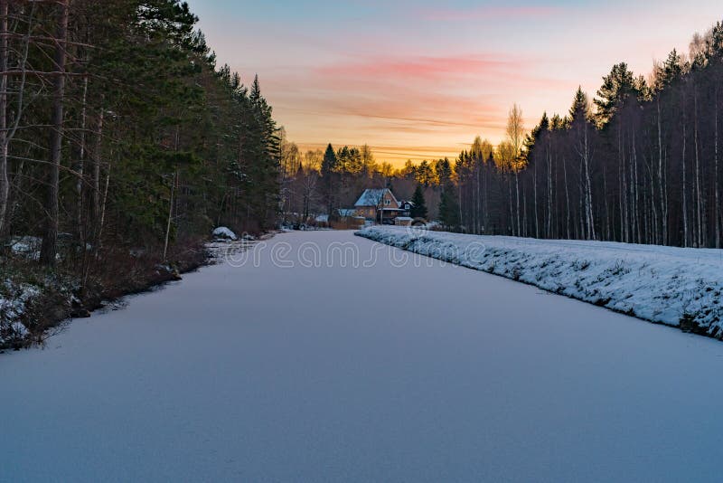 Frozen Channel Infront of a Beautiful Sunset Stock Image - Image of ...
