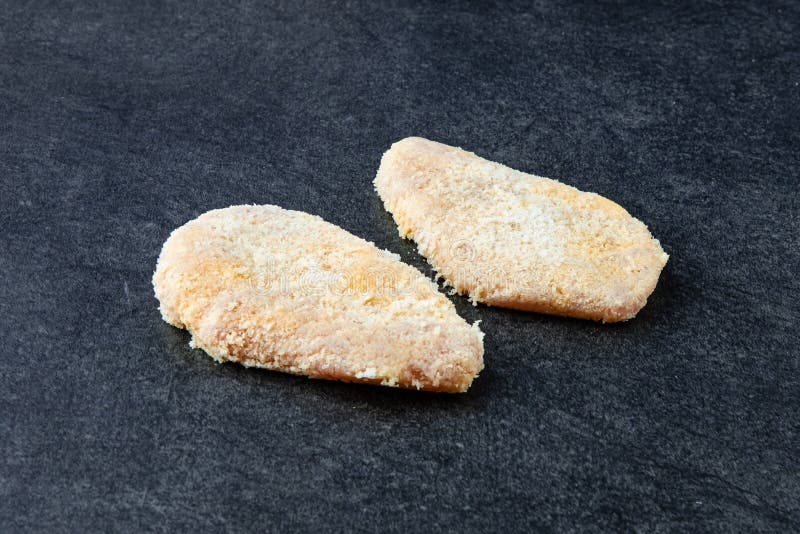 Frozen Chicken Cutlet on Stone Background. Frozen Semi-finished ...