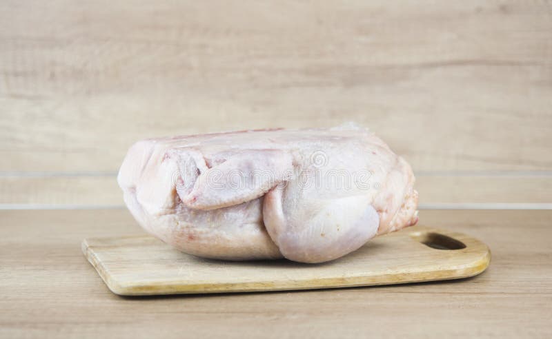 Frozen Chicken in the Frost on the Table Stock Image - Image of ...