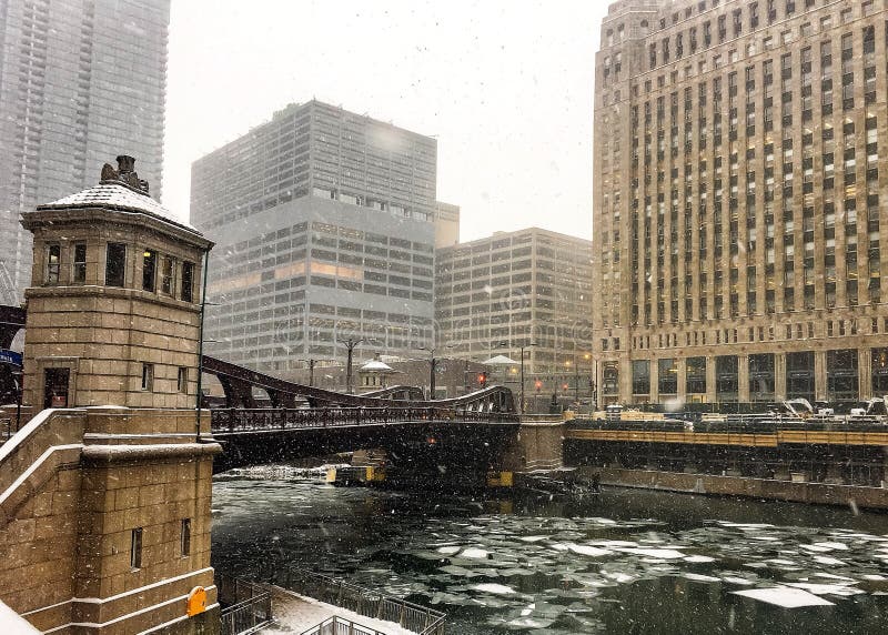 Frozen Chunks of Ice on Chicago River during Heavy Snowfall on December ...