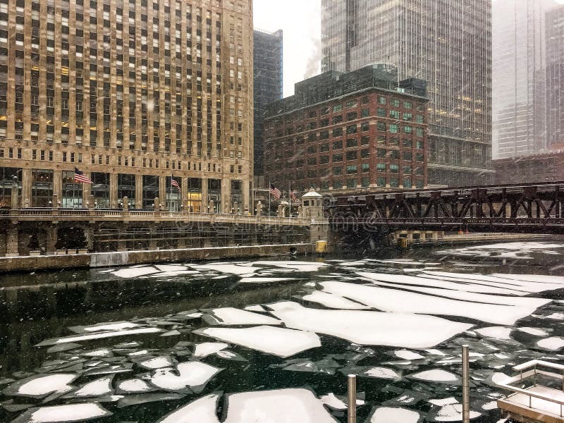 Frozen Chunks of Ice Floating on Chicago River during Snow Storm. Stock ...
