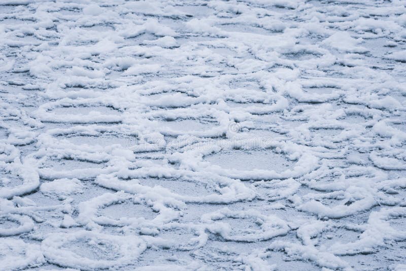 Frozen Circles on the Surface of the Water. Stock Image - Image of ...