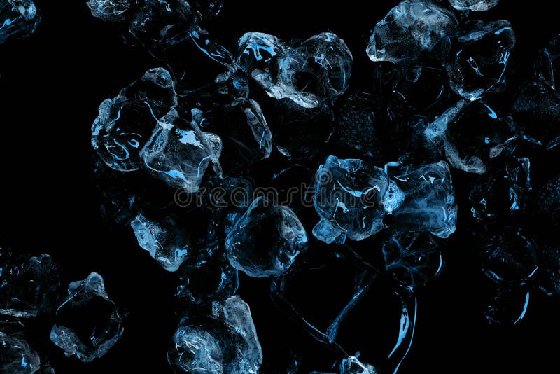Frozen Clear Ice Cubes with Blue Lighting Isolated on Black. Stock ...