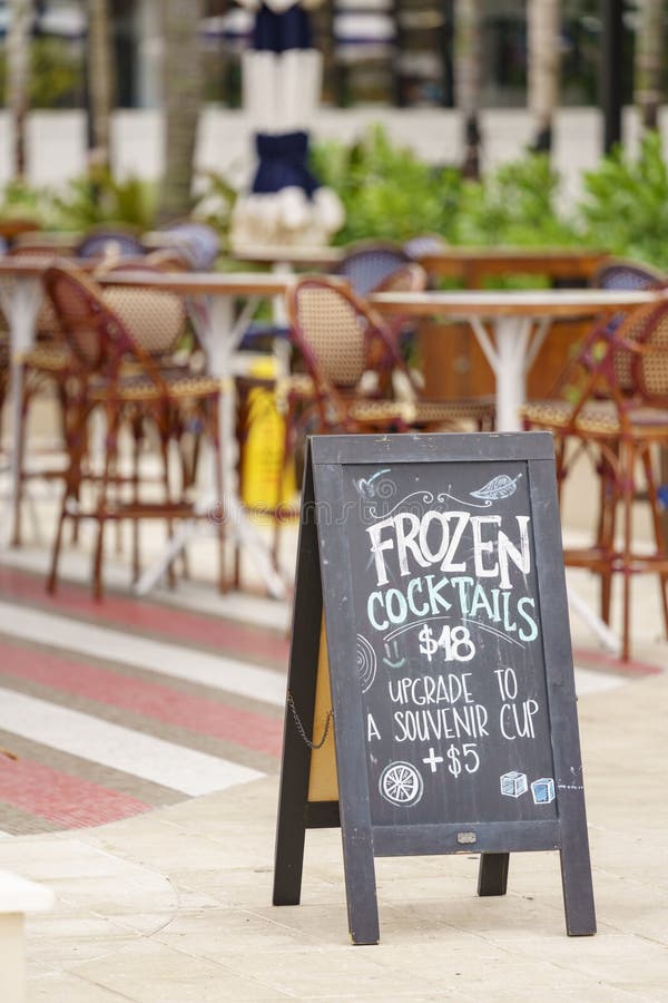 Frozen Cocktails Sign at a Restaurant in Miami Editorial Stock Photo ...