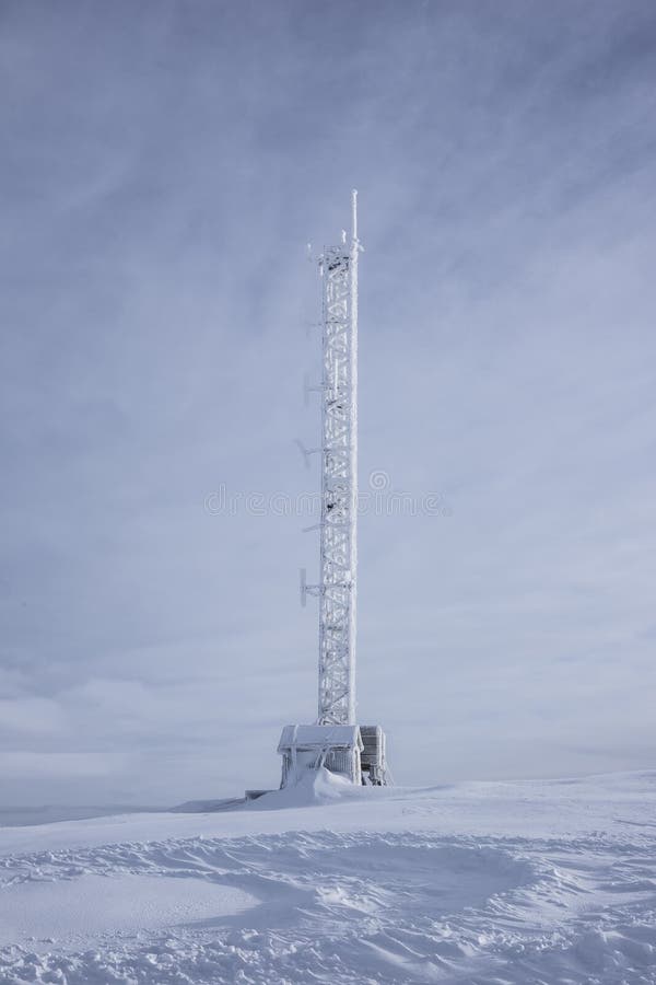 Frozen communication tower stock photo. Image of remote - 60956114