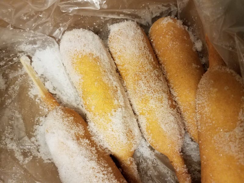 Frozen Corndogs on Stick with Ice and Plastic Stock Image - Image of ...