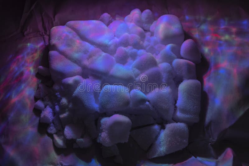 Frozen of Dry Ice on White Paper with Multicolored Aurora Lighting ...