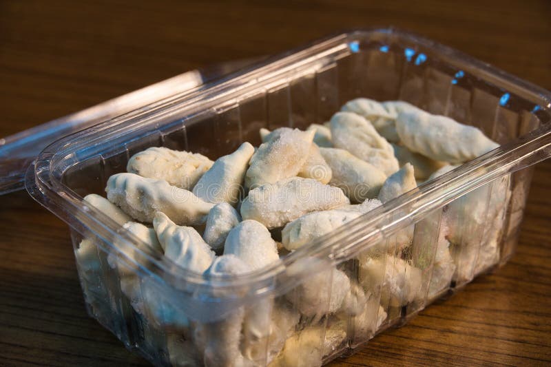 Frozen Dumplings in Plastic Container Stock Photo - Image of recipe ...