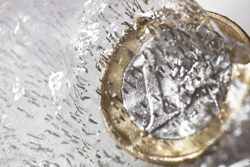 Frozen Euro coin melting stock photo. Image of cool, currency - 28632574