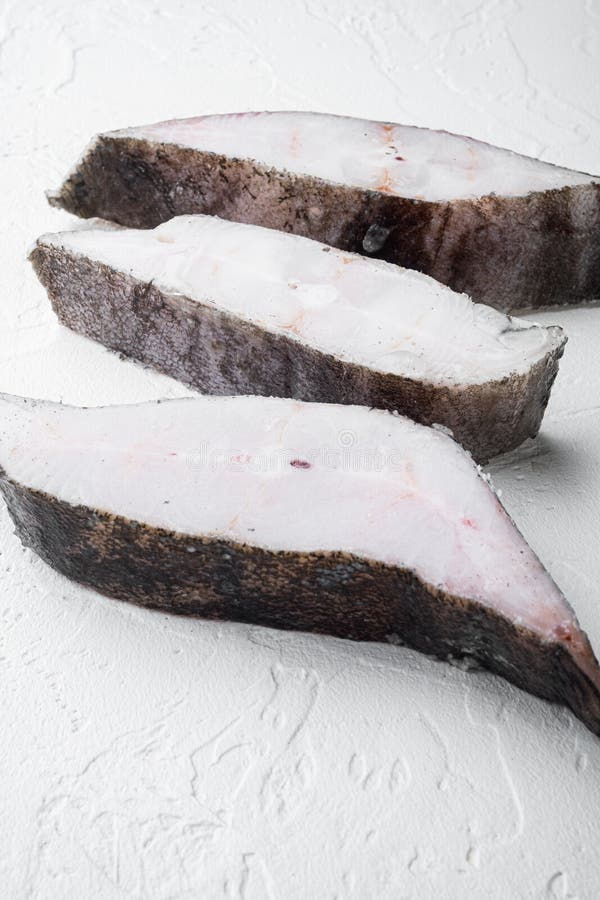 Frozen Fillets of White Fish, Pollock, on White Stone Table Background ...