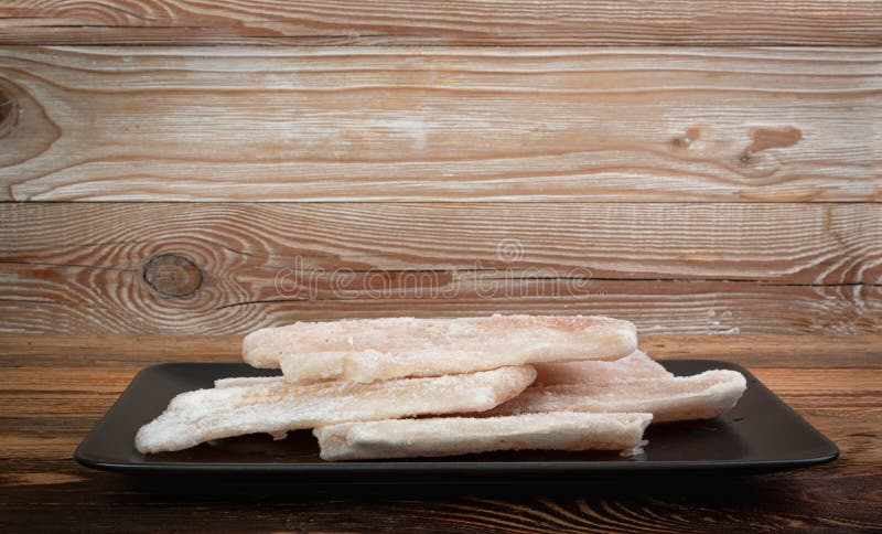 Frozen Fish on Black Isolated, White Cod Fillet, Iced Hake Filet ...