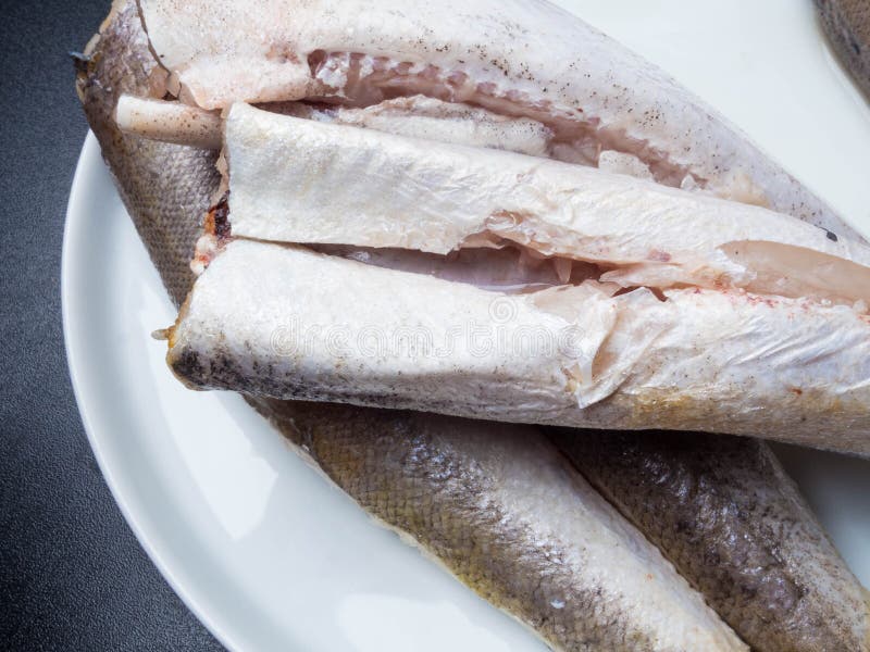 Frozen Fish Hake Isolated on White Plate Stock Image - Image of frozen ...