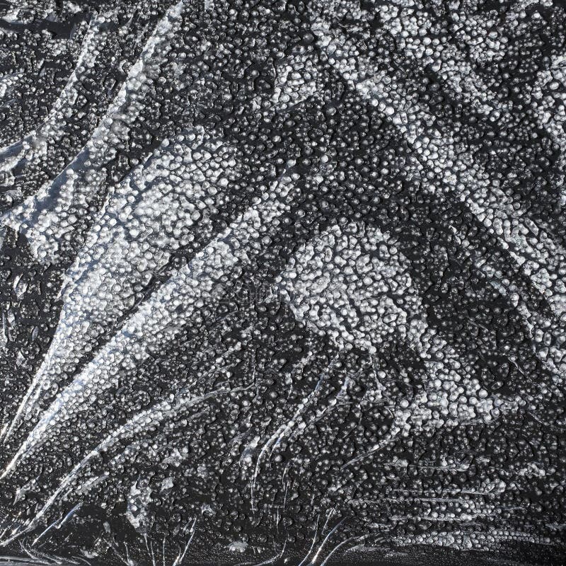 Frozen Flowing Raindrops and Rounded Ice Particles are Located on a ...