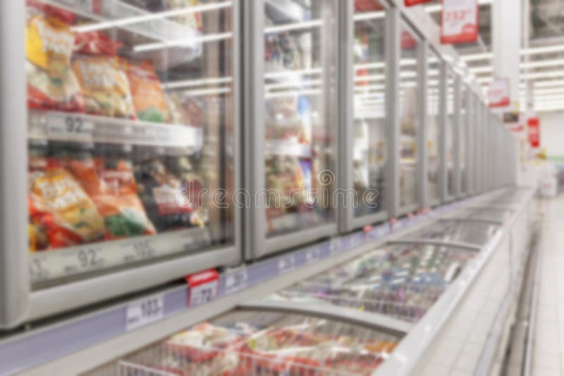 Frozen Food in a Refrigerator in a Large Supermarket. Blurred Stock ...