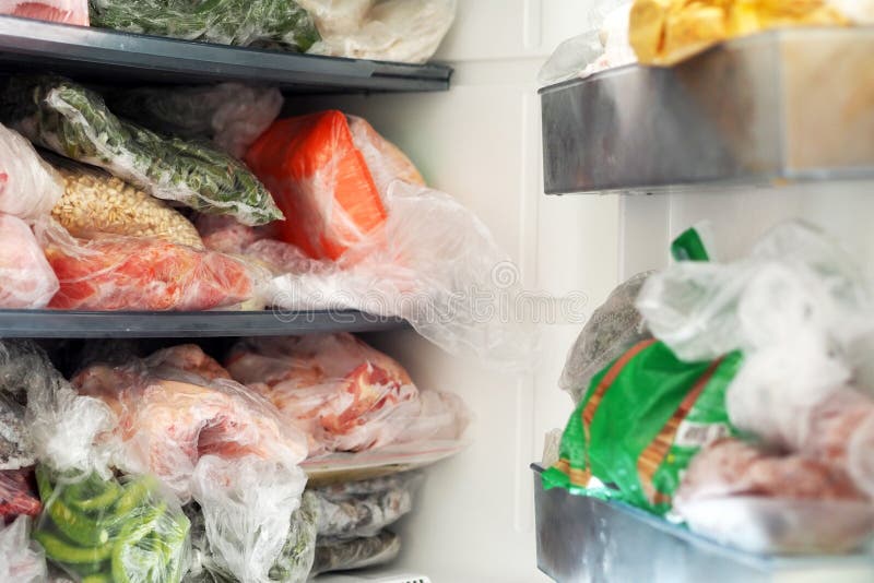 Frozen Foods, Frozen Vegetables and Meats in the Freezer Stock Photo ...