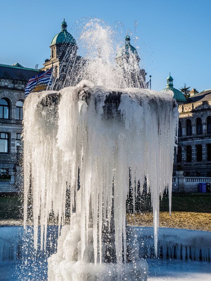 Frozen Fountain on the Lawn Stock Photo - Image of frozen, waterfall ...