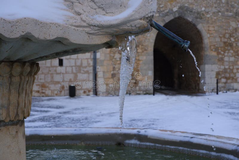 Frozen fountain with snow stock photo. Image of cold - 235892852