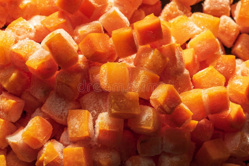 Frozen Fresh Carrot Cube Pieces Closeup Background Stock Photo - Image ...