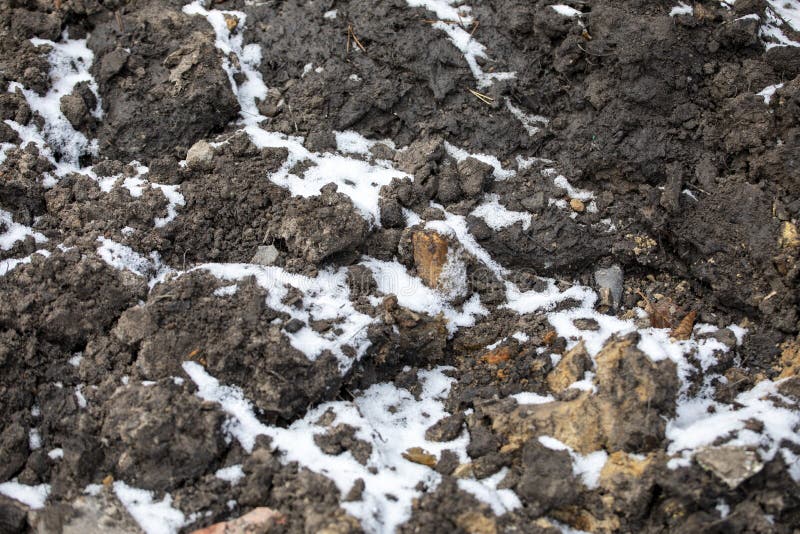 Frozen Ground with Snow and Stones, Natural Background Stock Photo ...