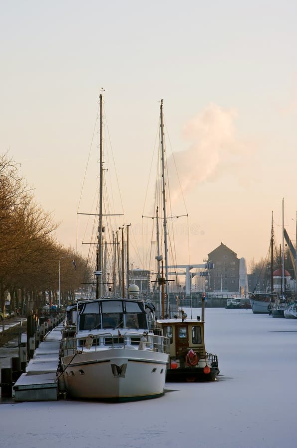 Frozen Harbour with Ships in Winter at Sunset Stock Image - Image of ...
