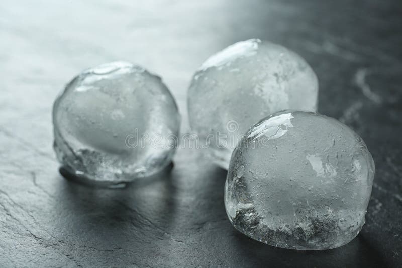 Frozen Ice Balls on Black Table, Closeup Stock Image - Image of pure ...