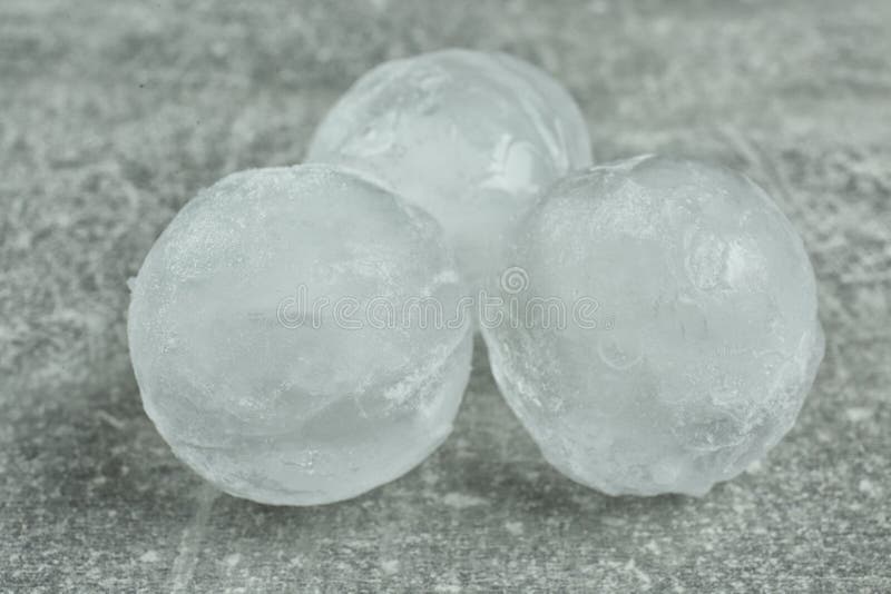 Frozen Ice Balls on Grey Table, Closeup Stock Photo - Image of froze ...