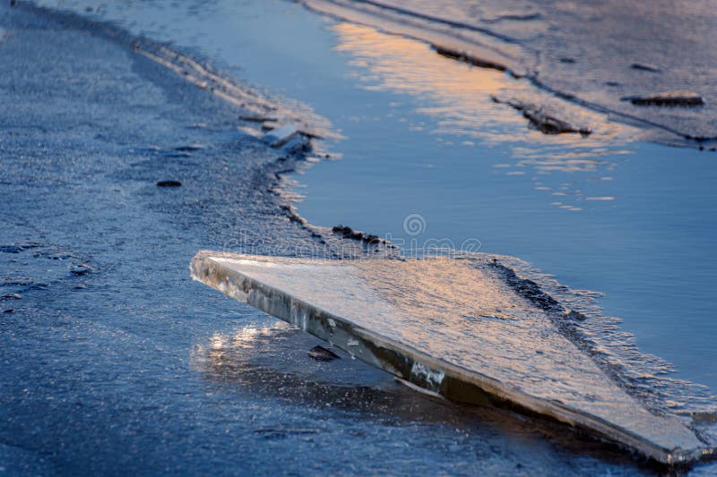Frozen Ice Floe on a Partially Melted River Stock Photo - Image of ...