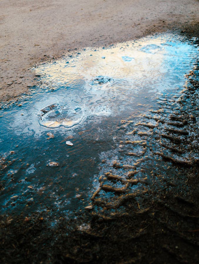 Frozen Ice Paddle on the Road Stock Image - Image of pavement, shore ...