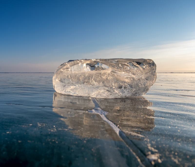 Sunlight Refracted in Piece of Ice Stock Image - Image of sunrise ...