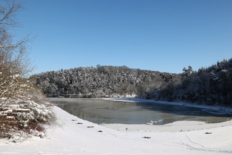 A Frozen Lake on a Clear Winter Day Stock Photo - Image of light, birch ...