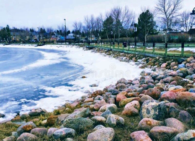 Frozen Lake at City of Cold Lake Stock Photo - Image of nature, rocks ...