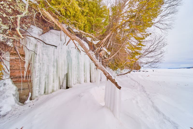 Frozen Lake Michigan with Icy Cliffs Covered in Frozen Icicles Stock ...