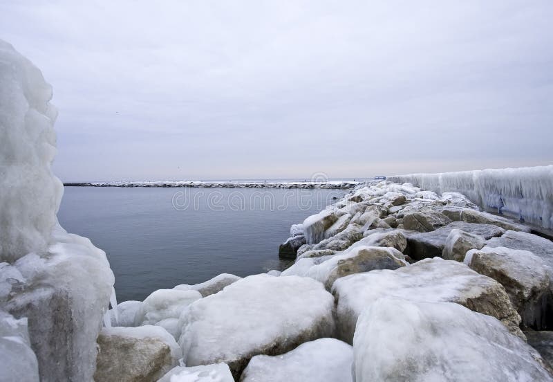 Frozen Lake Michigan Pier stock photo. Image of harbor - 12274090